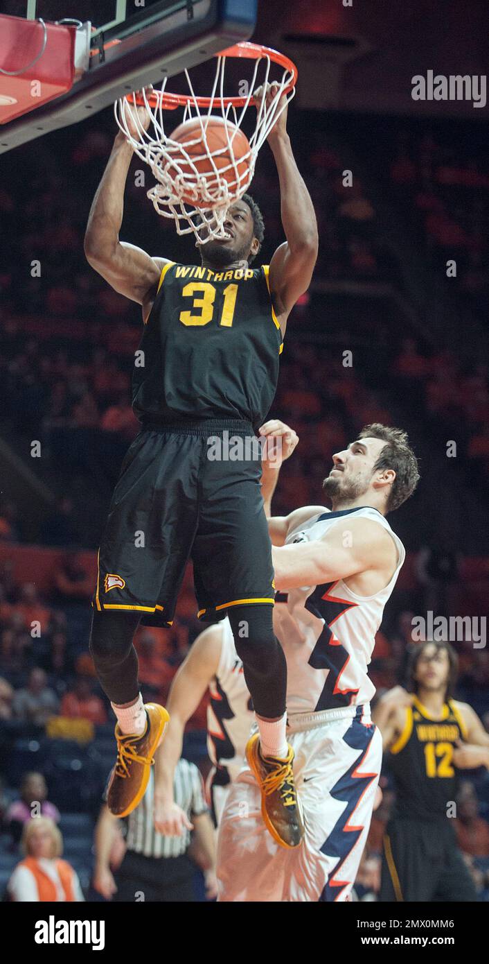 Winthrop forward Tevin Prescott (31) dunks over Illinois center ...