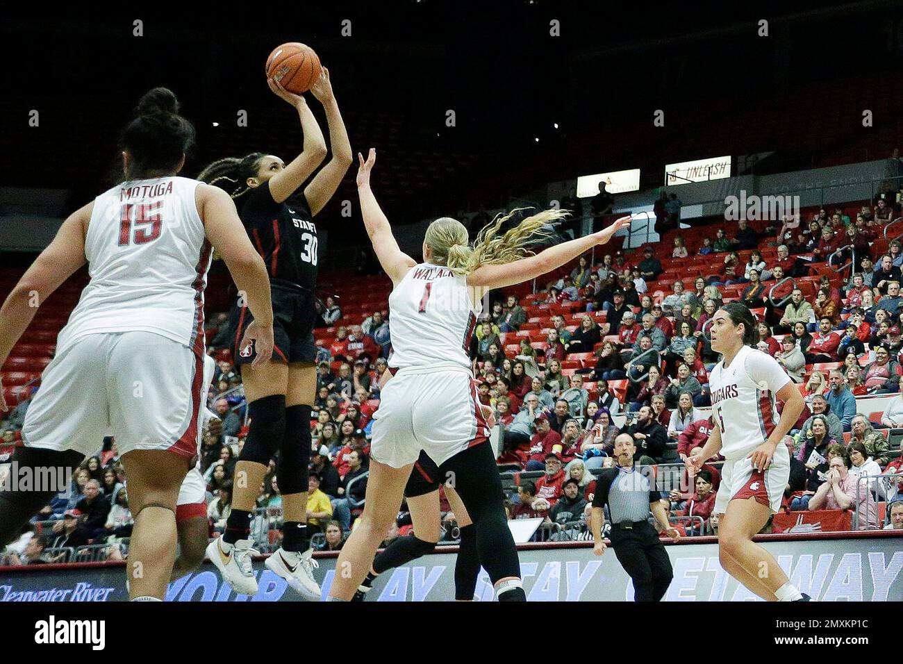 Stanford guard Haley Jones (30) shoots while defended by Washington ...