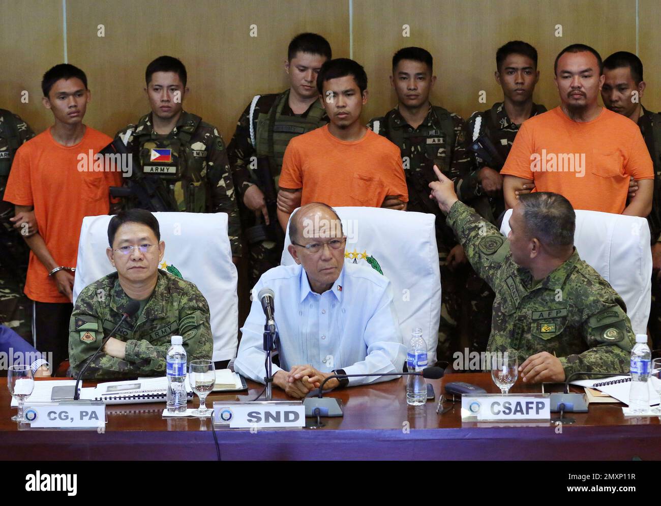 Philippine military chief Gen. Ricardo Visaya, right, points at ...