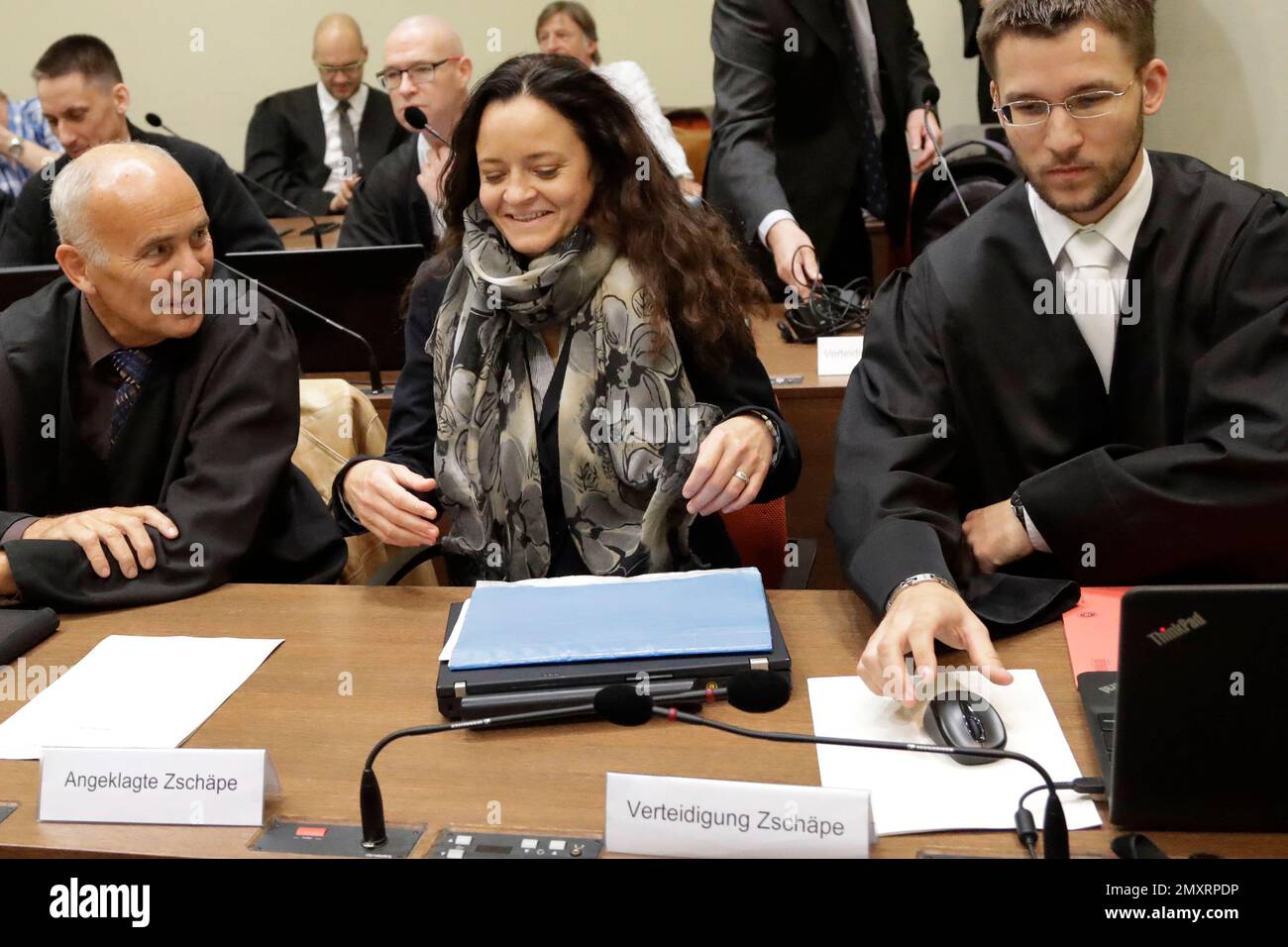 Terror suspect Beate Zschaepe arrives at the court room besides her ...