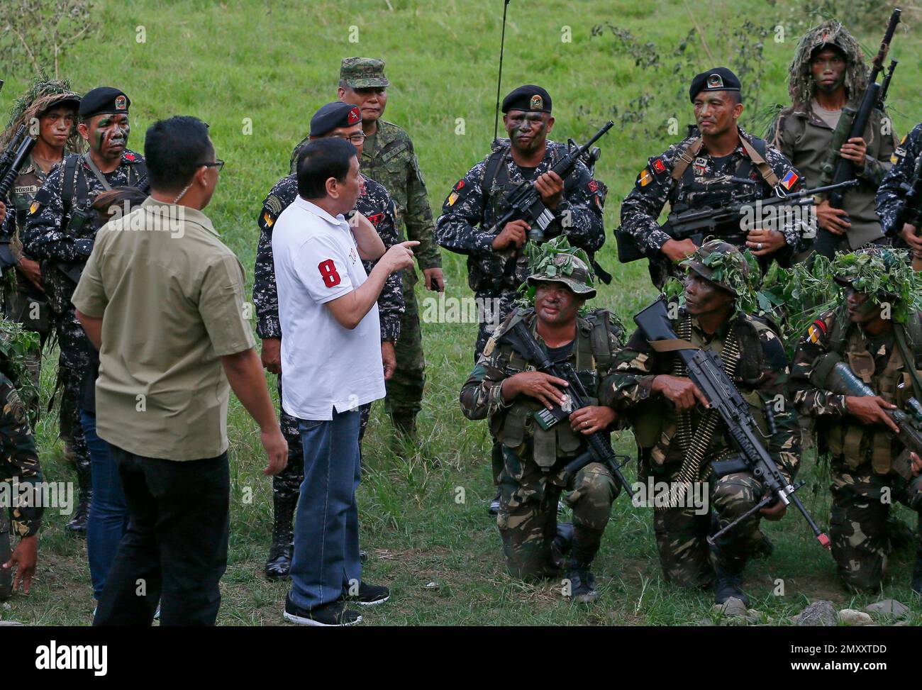 Philippine President Rodrigo Duterte talks to the Philippine Army Scout ...
