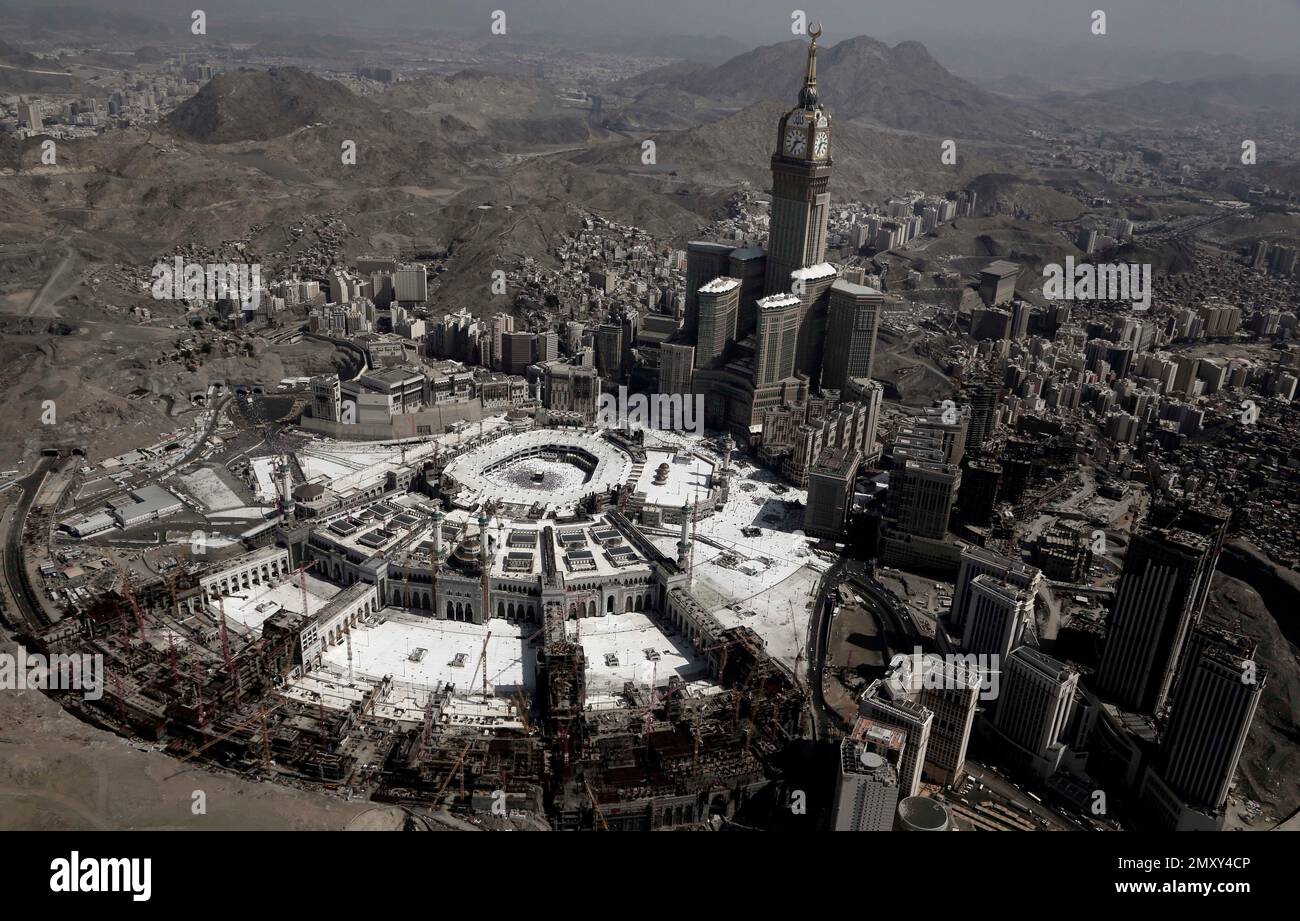 In this aerial photo made from a helicopter, the Abraj Al-Bait Towers ...