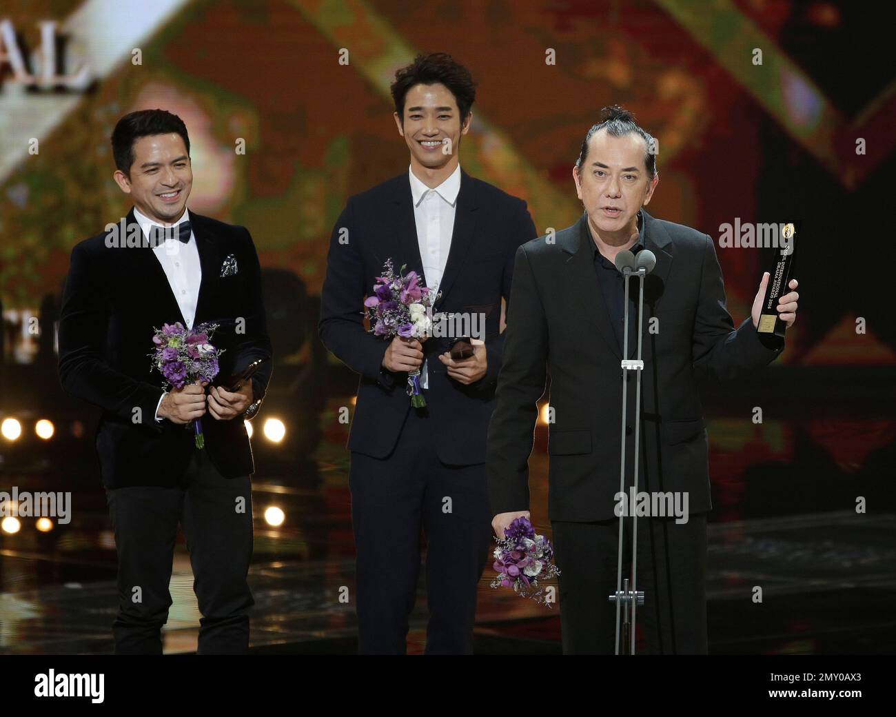 Hong Kong actor Anthony Wong, right, speaks as Taiwanese actor Liu Yi ...