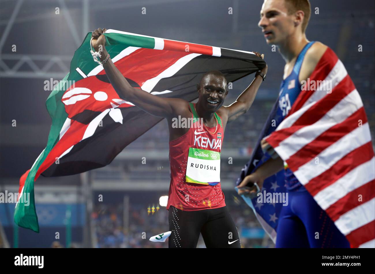 Kenya's David Lekuta Rudisha, left, celebrates winning the men's 800 ...