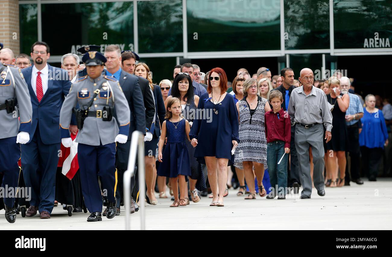 Dechia Gerald, center, wife of slain Baton Rouge police officer Matthew ...