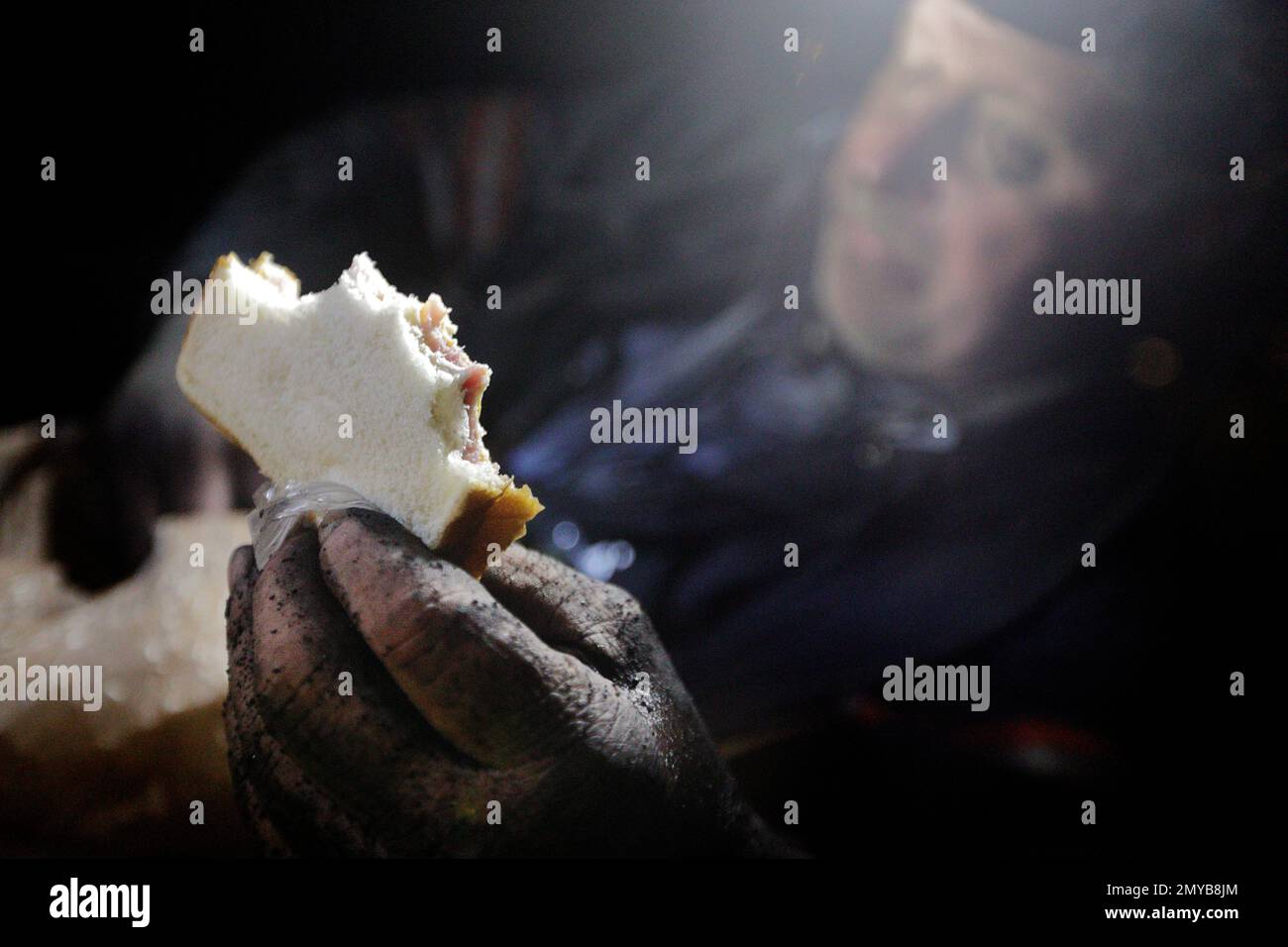 CLIMATE CHANGE: Coal miner Scott Tiller eats a sandwich during his ...