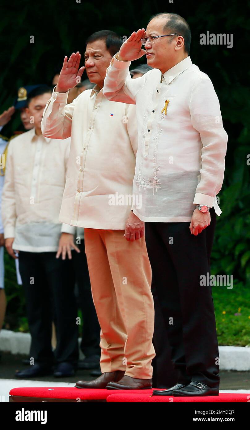New Philippine President Rodrigo Duterte, left, and outgoing President ...