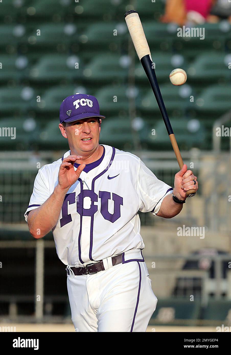 TCU head coach Jim Schlossnagle takes infield practice with his team ...