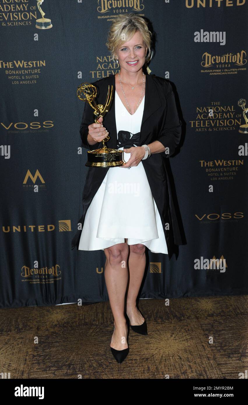 Mary Beth Evans poses in the pressroom with the award for outstanding ...
