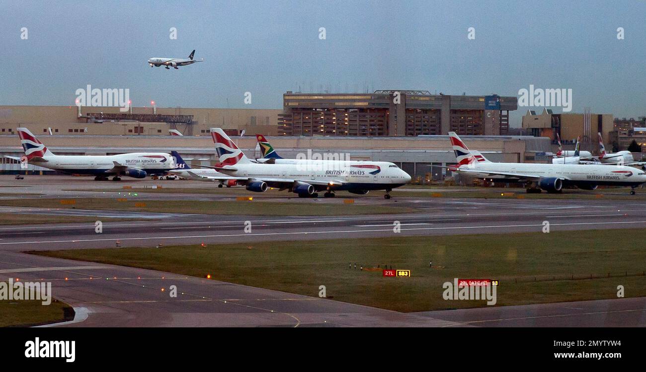 FILE - In this Friday, Dec. 12, 2014 file photo, aircraft wait on the ...