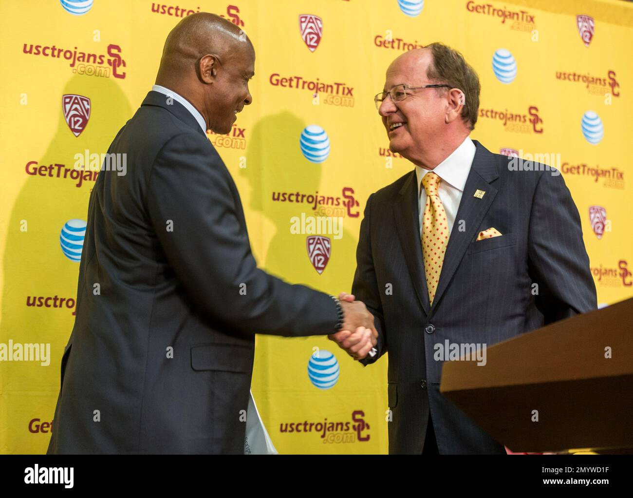 University of Southern California president C.L. Max Nikias, right ...