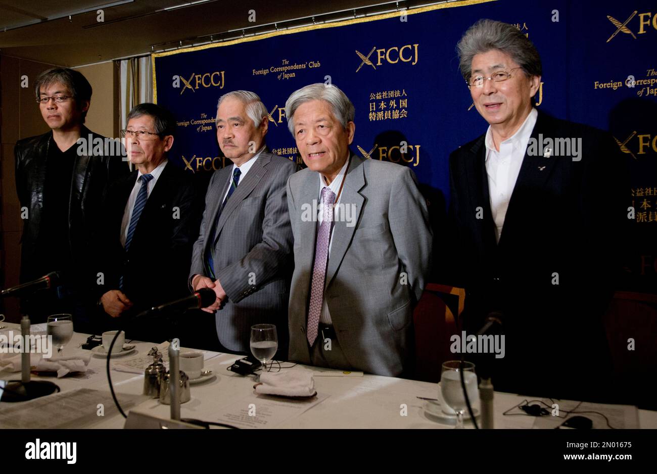 Japanese journalists, from left, Osamu Aoki, Akihiro Otani, Shigetada ...