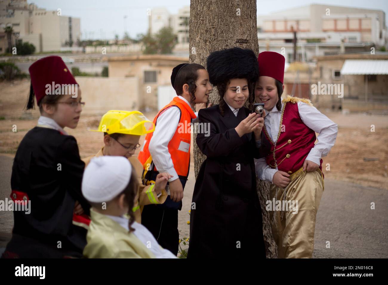 Jewish Orthodox children of the Tzanz Hasidic dynasty community look at ...