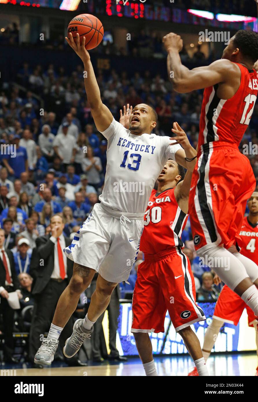 Kentucky's Isaiah Briscoe (13) drives past Georgia's Kenny Gaines (12 ...