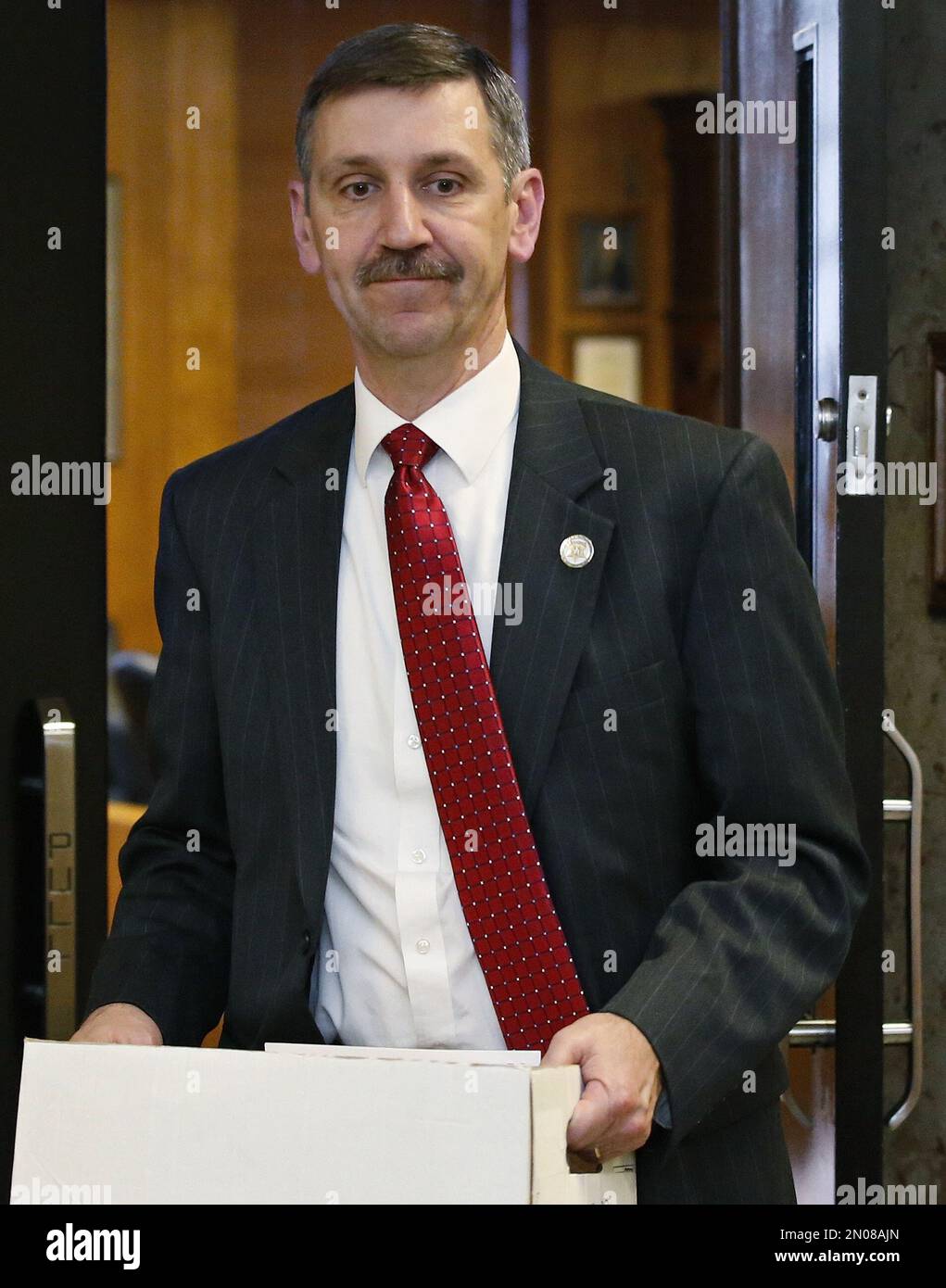 Steve Kunzweiler, Tulsa County district attorney, leaves a courtroom in ...