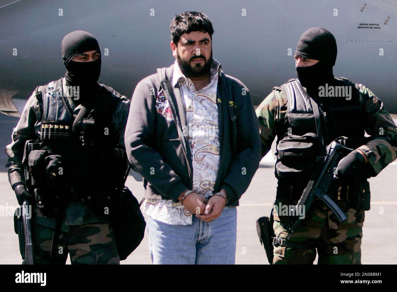 FILE - In this Jan. 21, 2008 file photo Mexican federal police officers ...