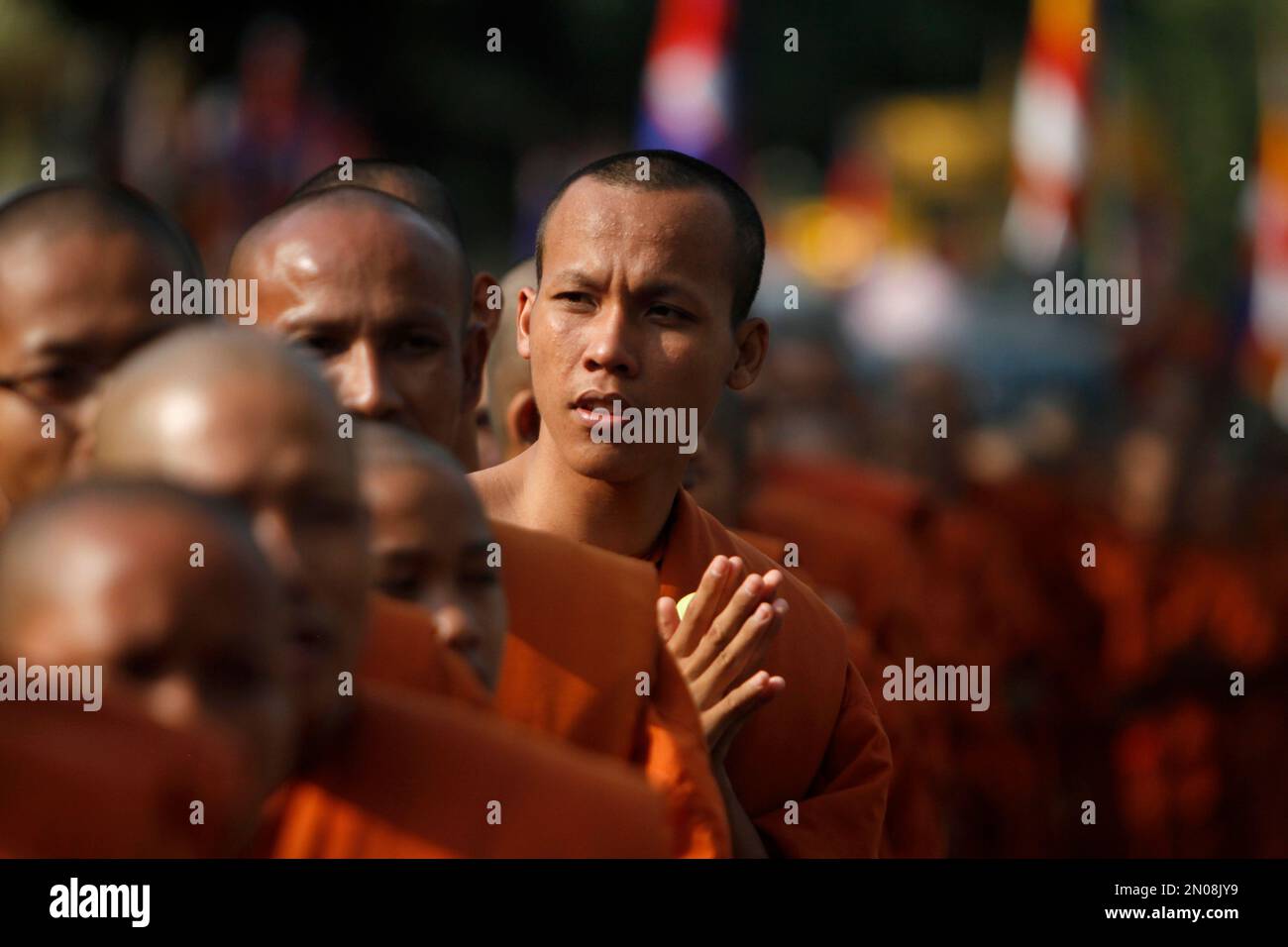 Cambodian Buddhist monks march to mark the annual Meak Bochea ceremony ...