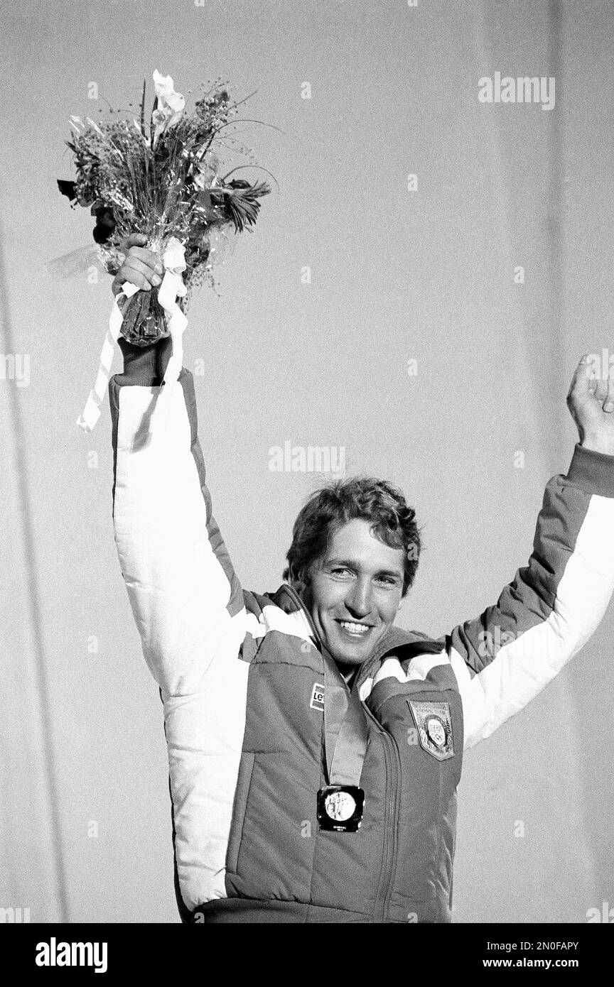 FILE - In this Feb. 16, 1984 file photo, Bill Johnson raises his arms ...