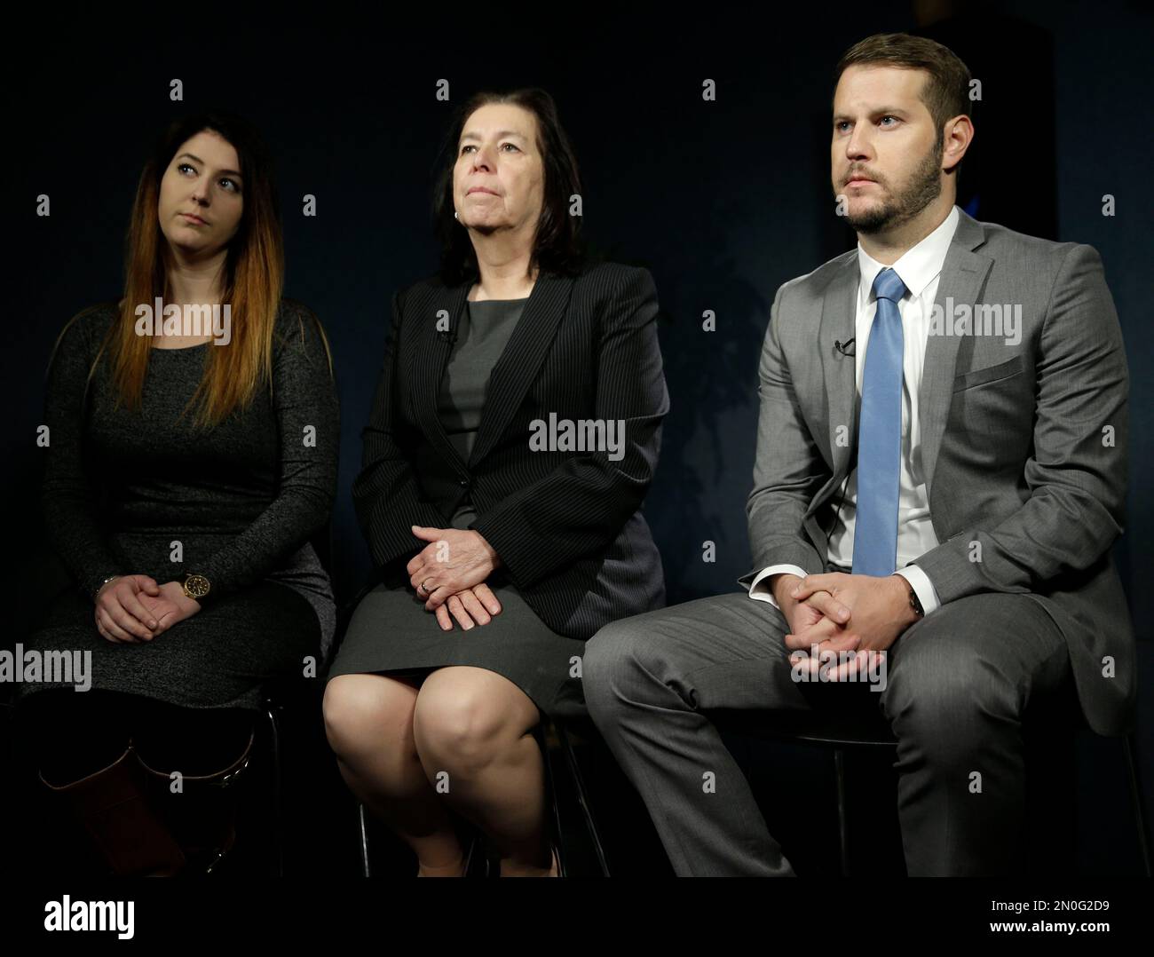 Christine Levinson, center, wife of Robert Levinson, and her children ...