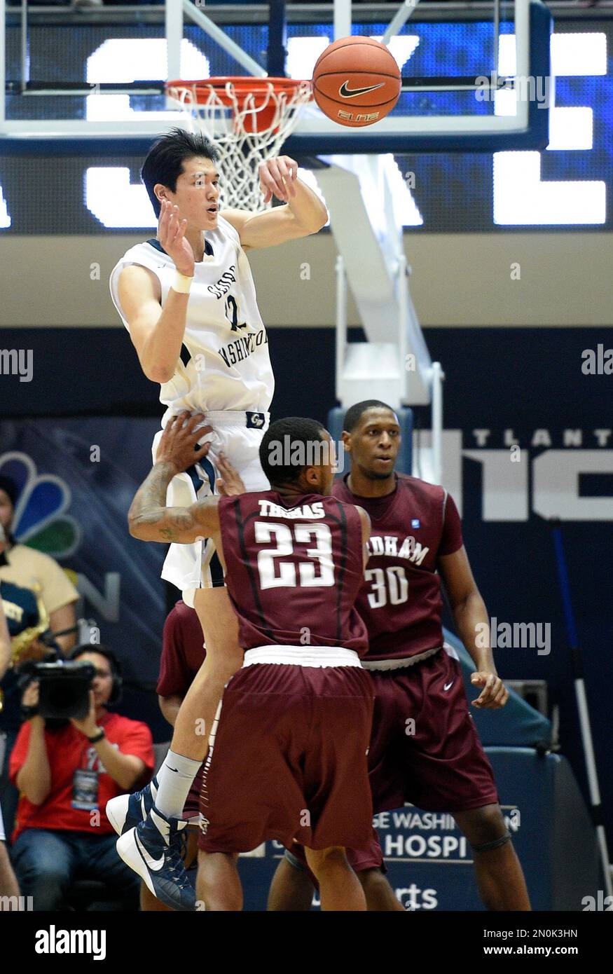 George Washington forward Yuta Watanabe, top, passes the ball against ...