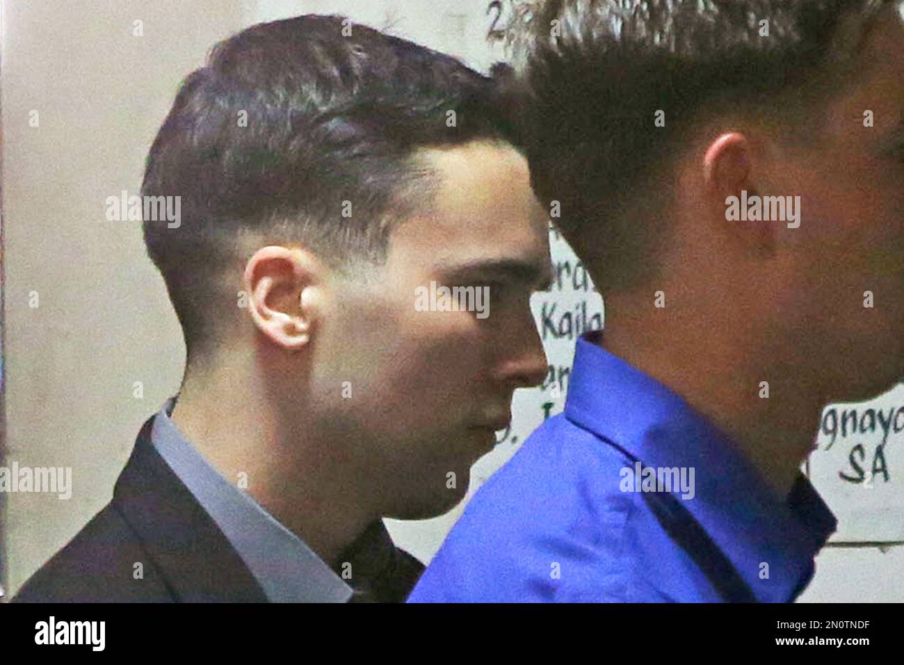 U.S. Marine Lance Cpl. Joseph Scott Pemberton, left, arrives for the ...