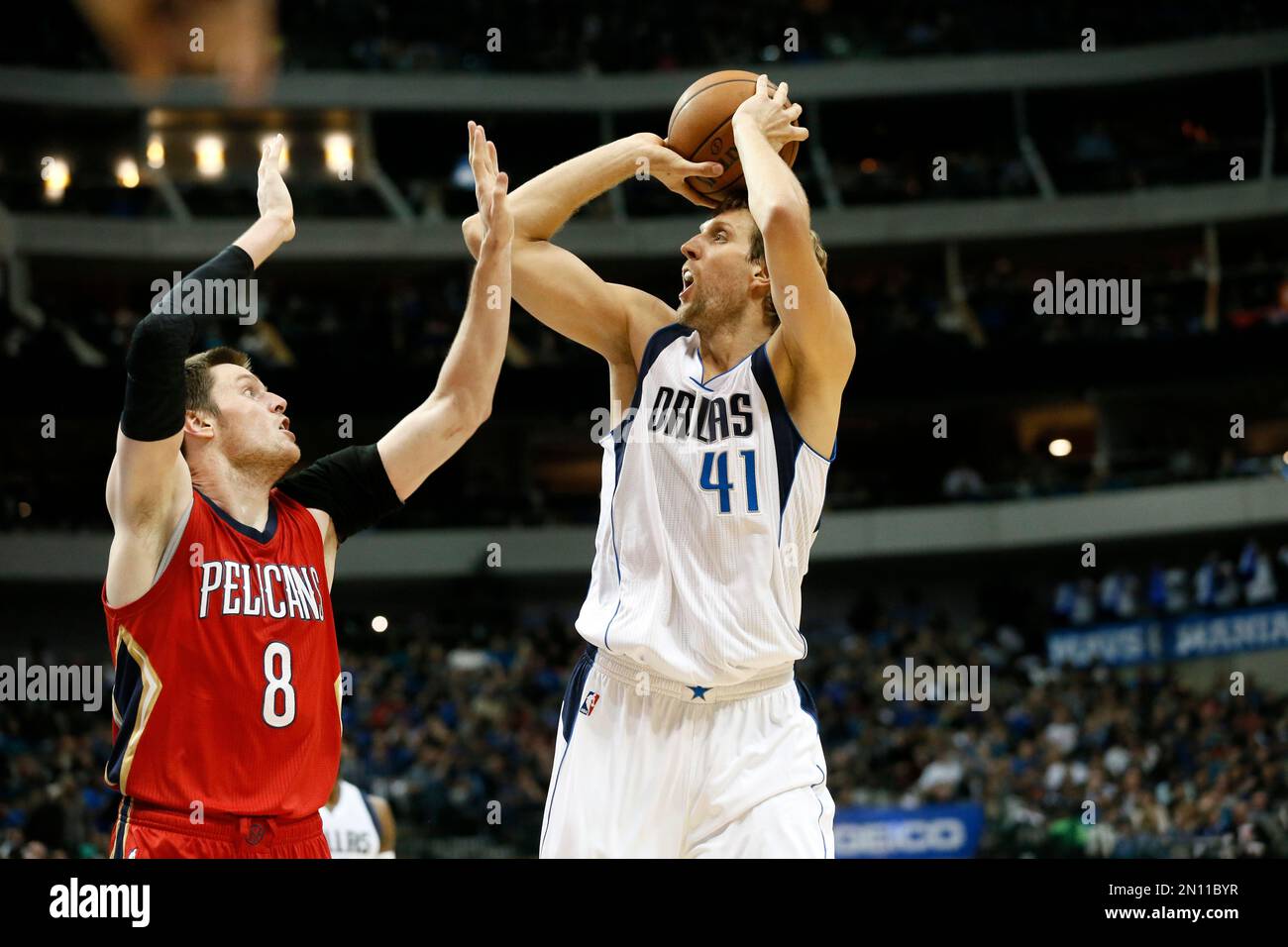 New Orleans Pelicans' Luke Babbitt (8) defends as Dallas Mavericks ...