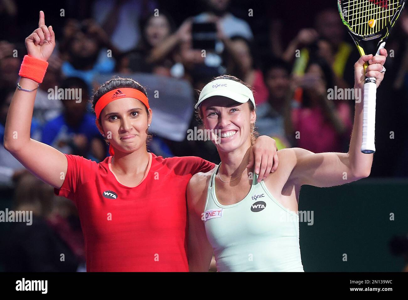 Sania Mirza of India, left, and Martina Hingis of Switzerland, right ...