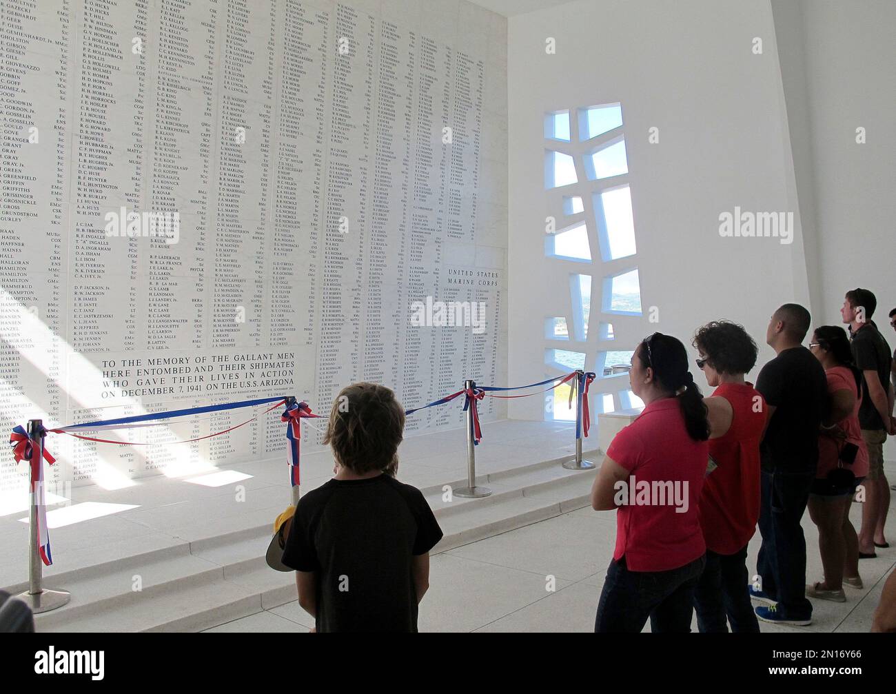 FILE - This Nov. 21, 2014 file photo shows visitors looking at a wall ...
