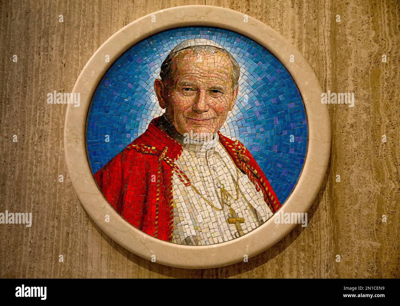 In this Sept. 1, 2015, photo, a tile mosaic of Pope John Paul II hangs ...