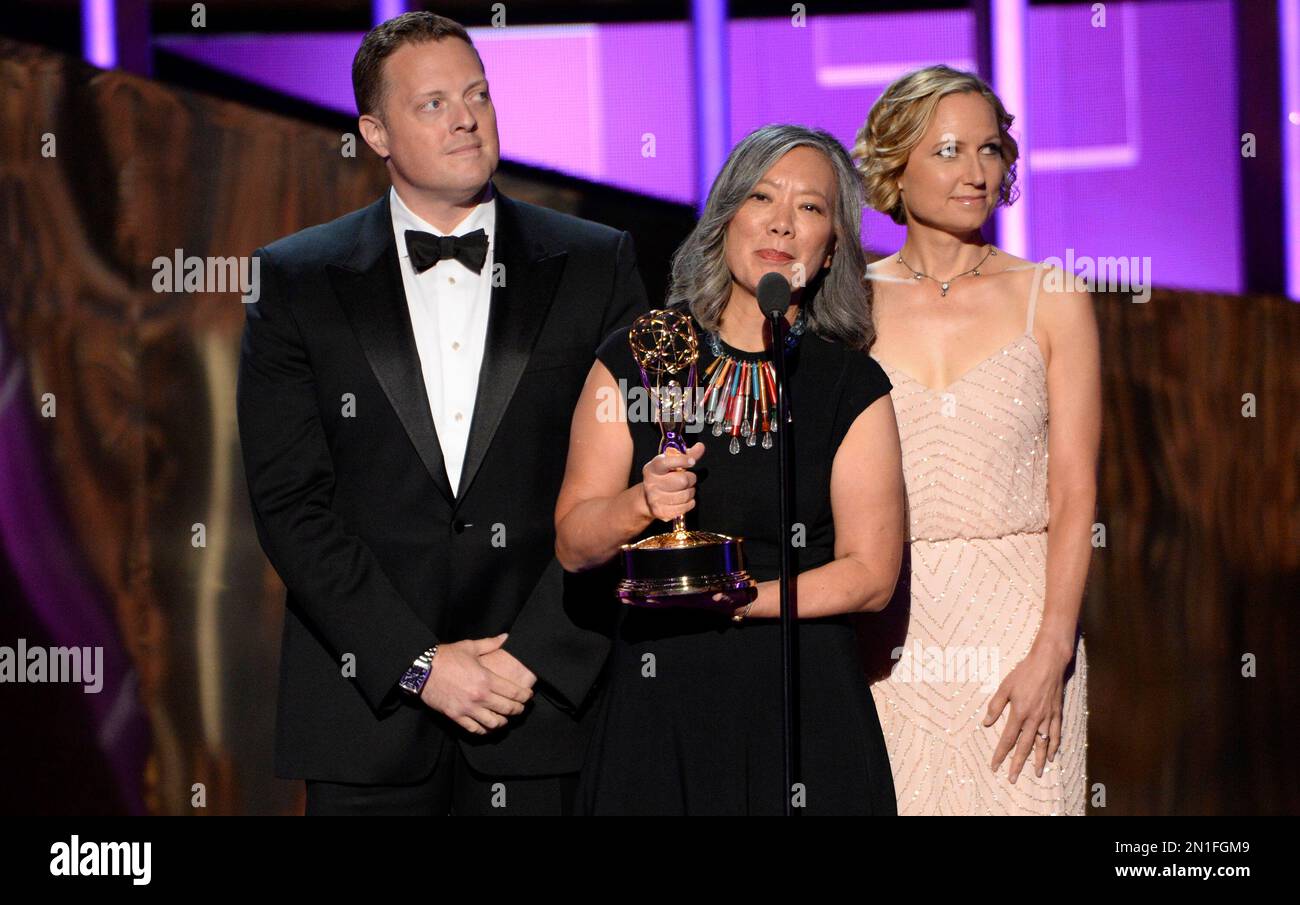 EXCLUSIVE - Robert Mancini, from left, Lisa Hsia and Aimee Viles accept ...