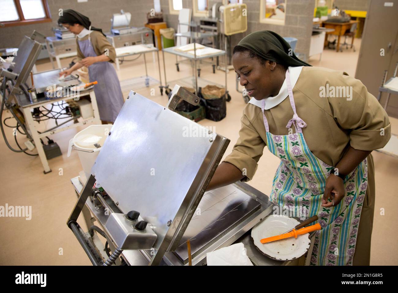 Poor Clares nuns Sister Holy Spirit, right, and Sister Isabel prepare ...