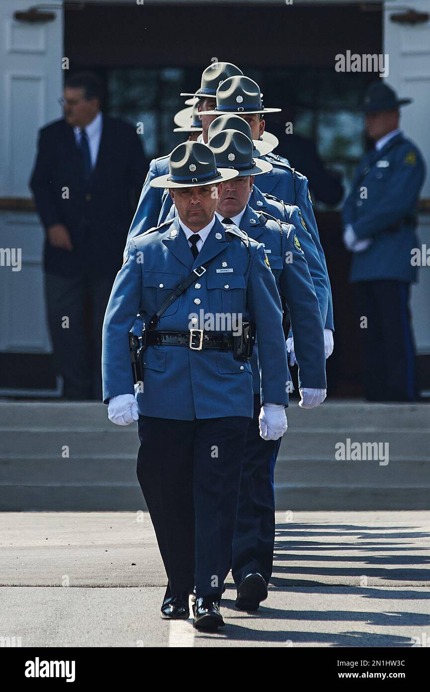 Missouri State Highway Patrol troopers exit after the funeral services ...