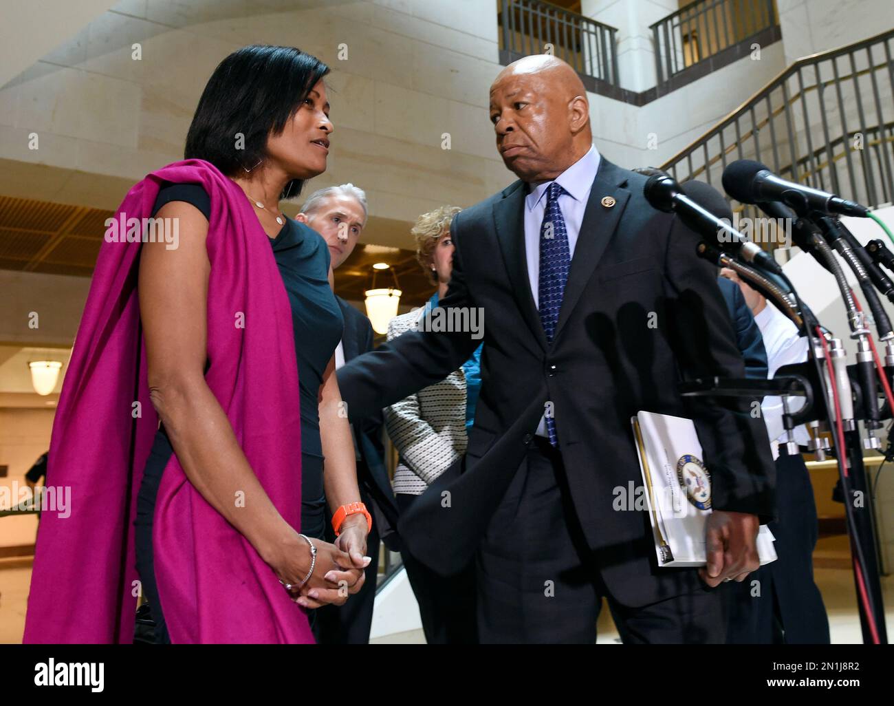 Former Hillary Rodham Clinton aide Cheryl Mills, left, is directed to ...