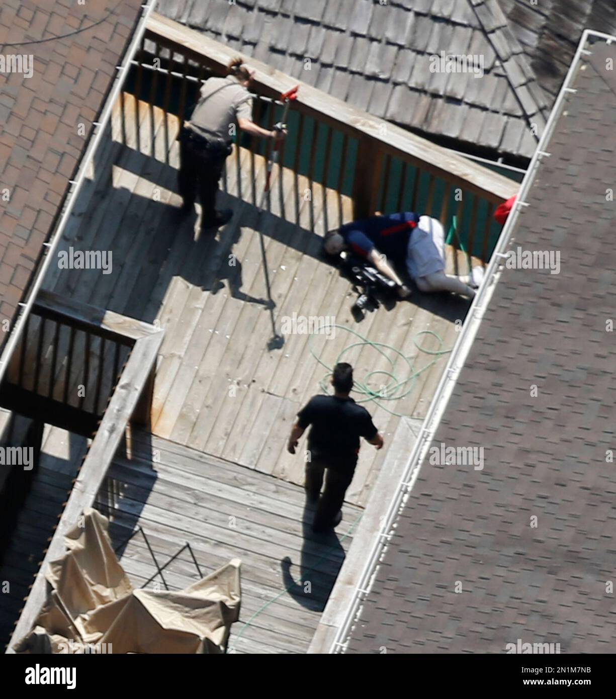 EDS NOTE: GRAPHIC CONTENT - Investigators look at the body of WDBJ-TV ...