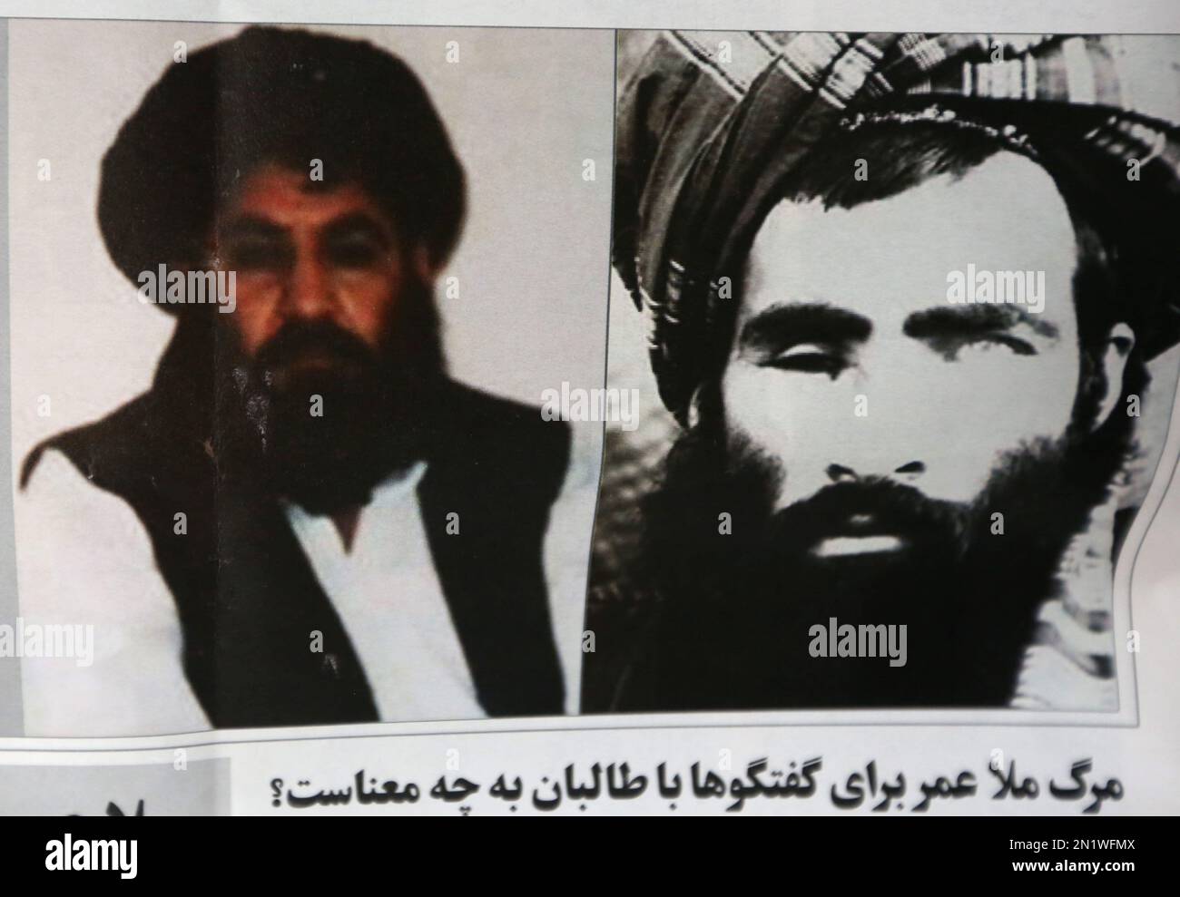 An Afghan newspaper headlines pictures of the new leader of the Afghan ...