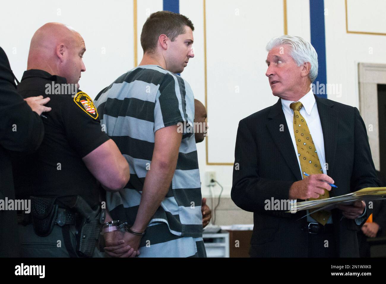 Former University of Cincinnati police officer Ray Tensing, center left ...