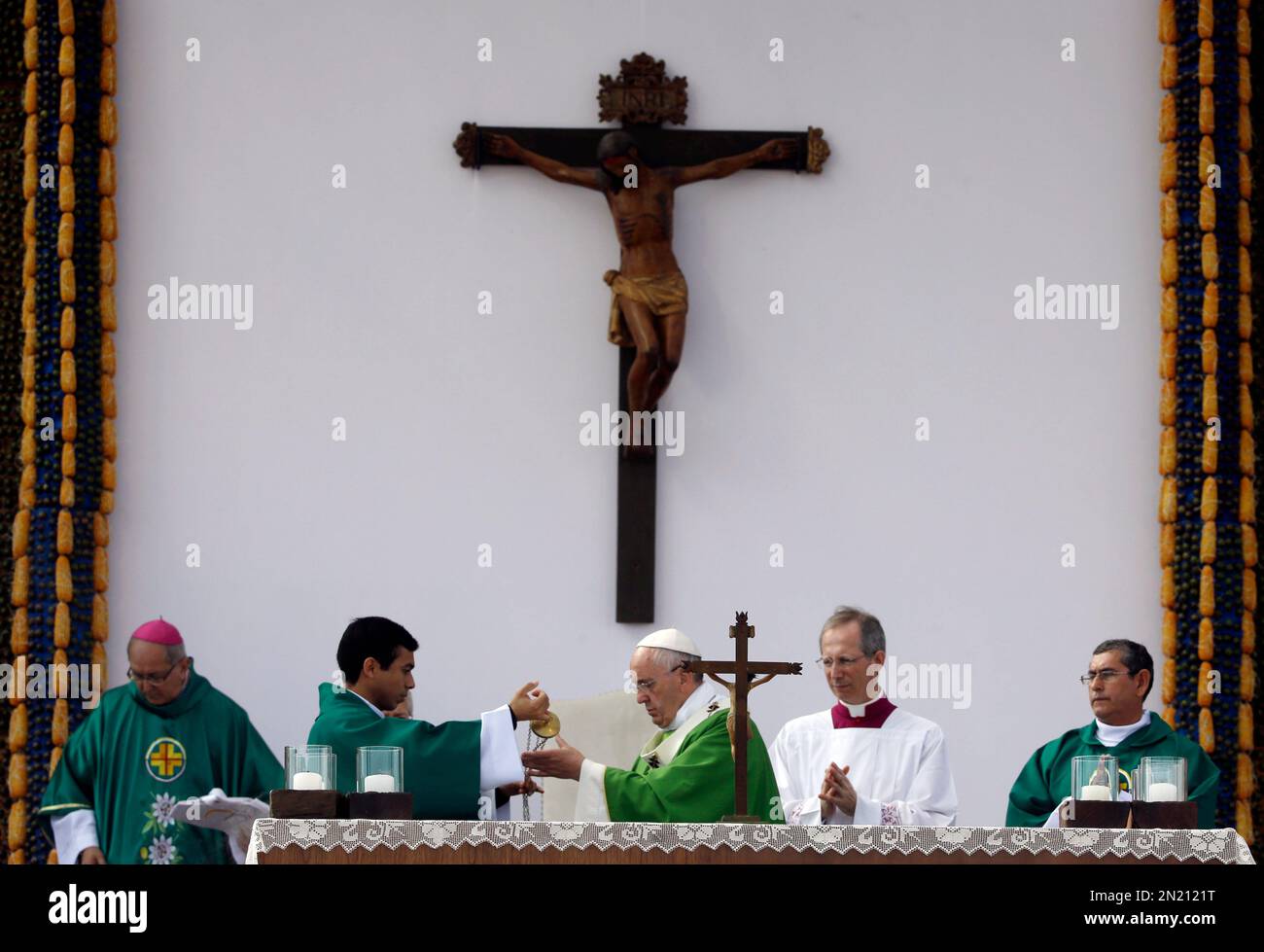 Pope Francis, center, celebrates mass in Asuncion, Paraguay, Sunday ...