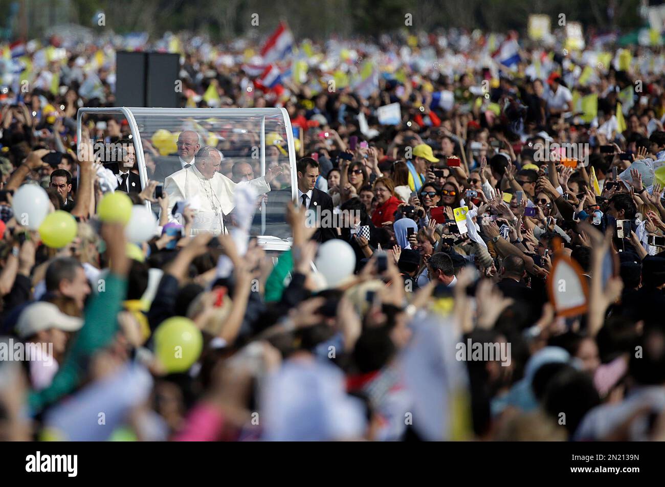 Pope Francis arrives aboard the popemobile to celebrate mass in ...