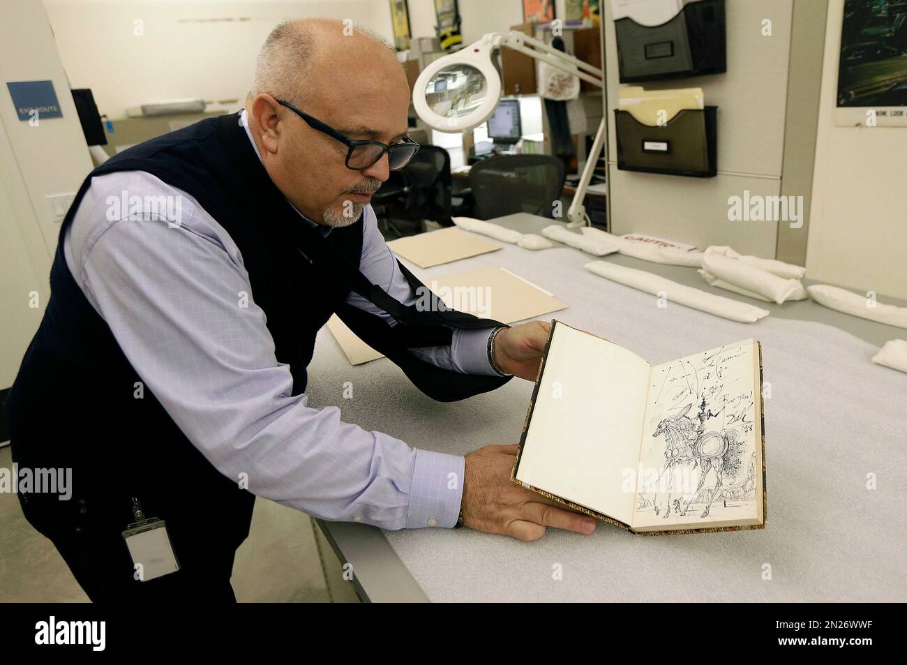 In this May 1, 2015 photo, Michael Labrie, director of collections and ...