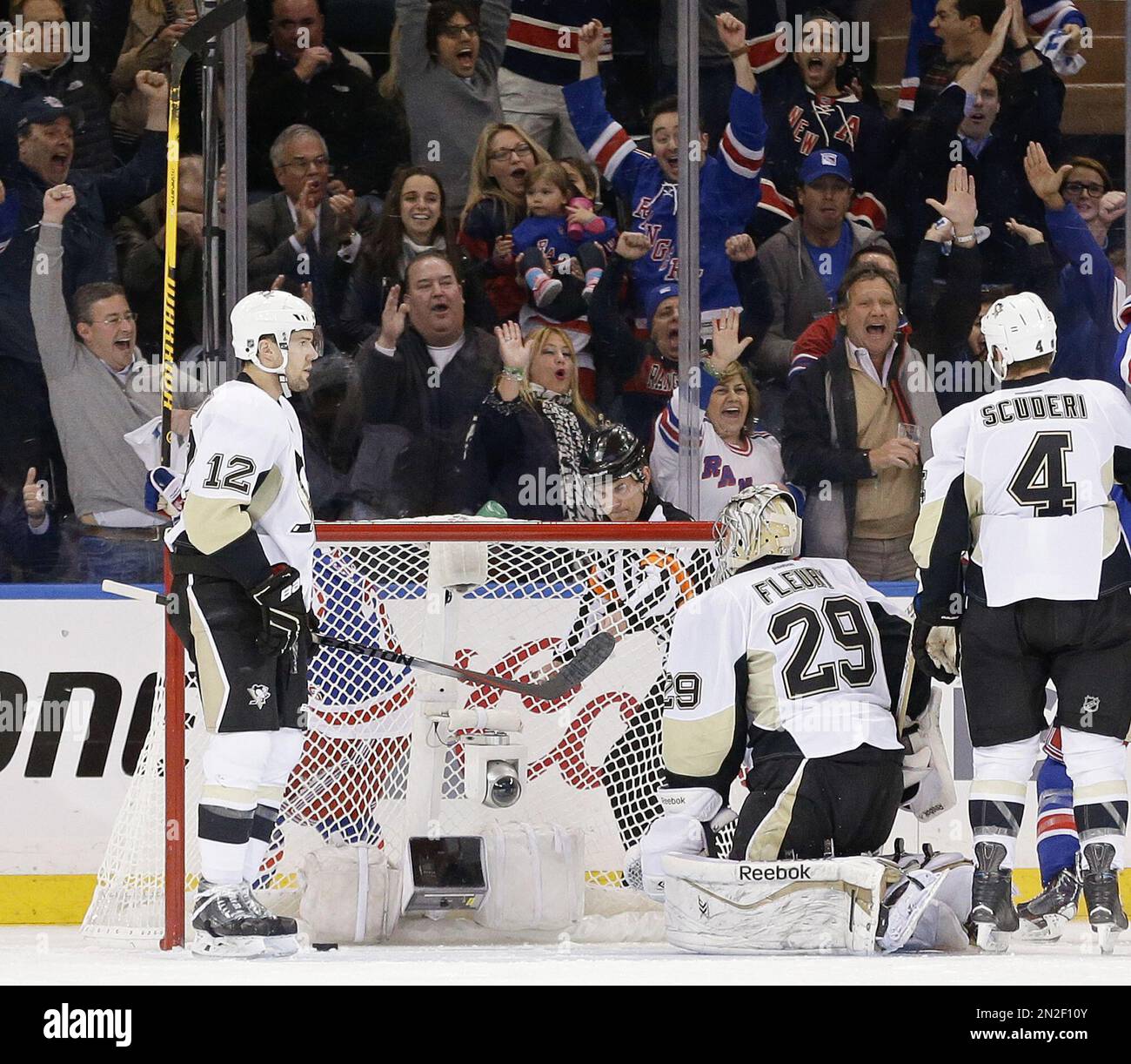 New York Rangers fans cheer as Pittsburgh Penguins goalie Marc-Andre ...