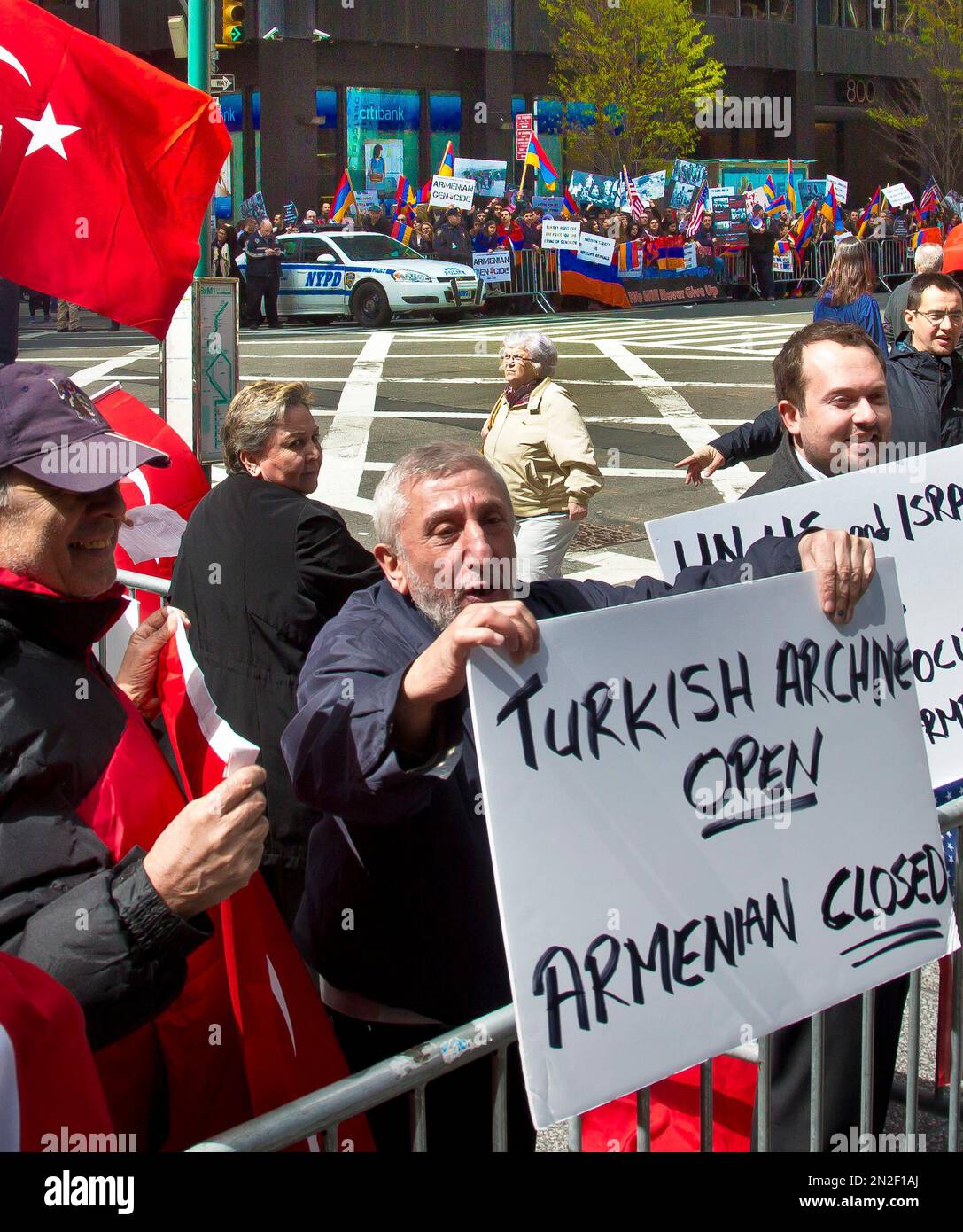 A handful of Turkish protesters holding a counter demonstration is ...