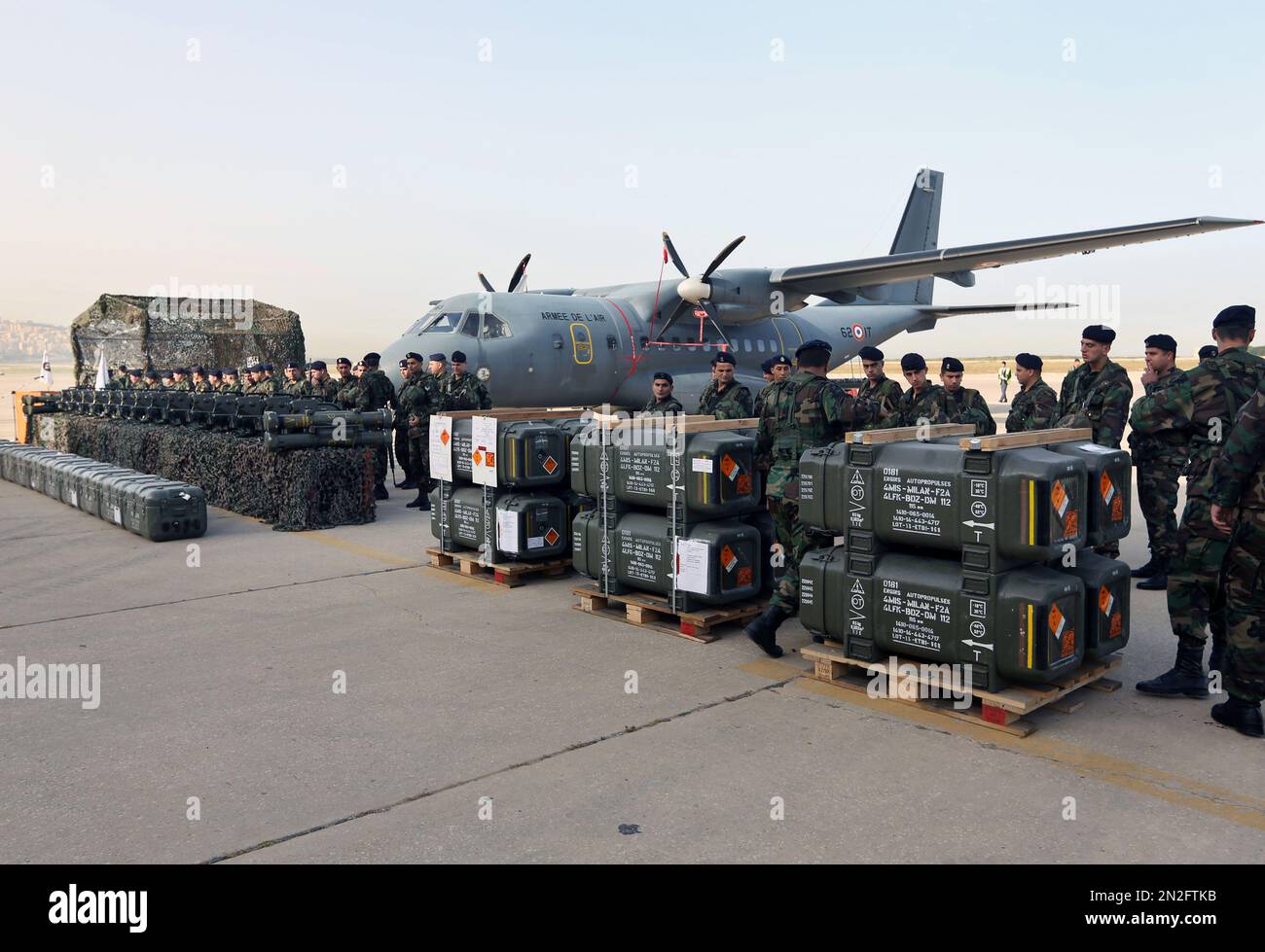 Lebanese army soldiers stand in front of French weapons at the Rafik ...