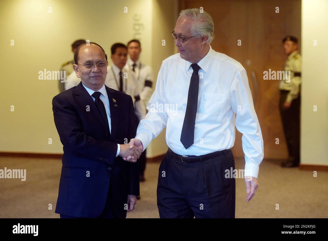 Myanmar President Thein Sein, left, is greeted by Singapore Emeritus ...