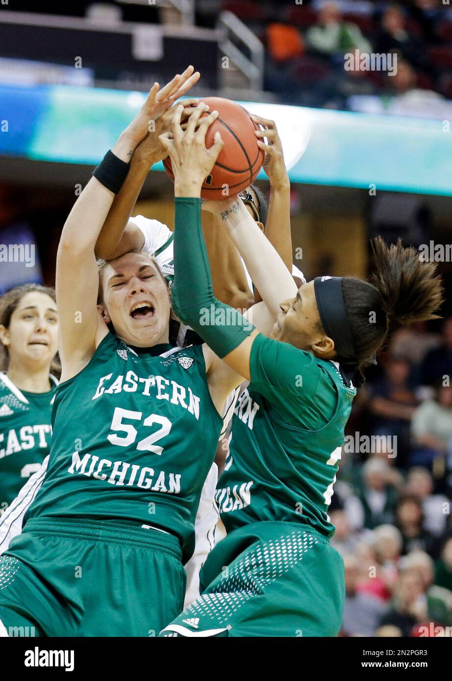 Eastern Michigan center Rachel Kehoe (52) and Phillis Webb fight for a ...