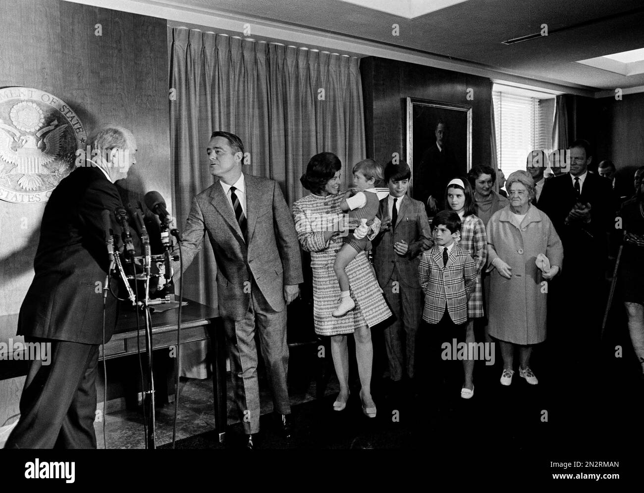 Secretary of State Dean Rusk congratulates Sargent Shriver at the State ...