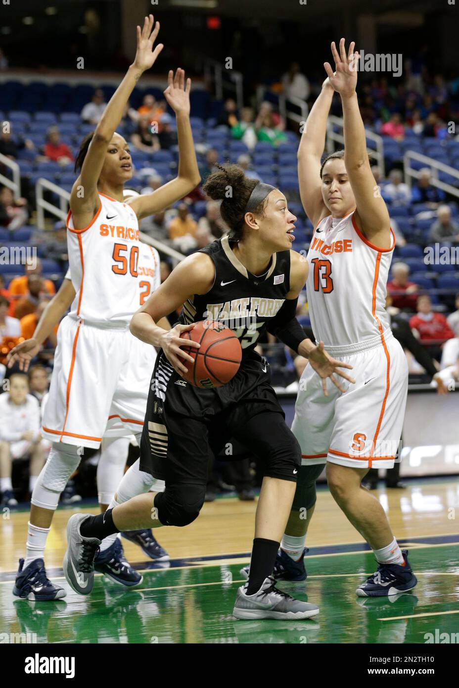 Wake Forest's Dearica Hamby (25) looks to pass as she is trapped by ...