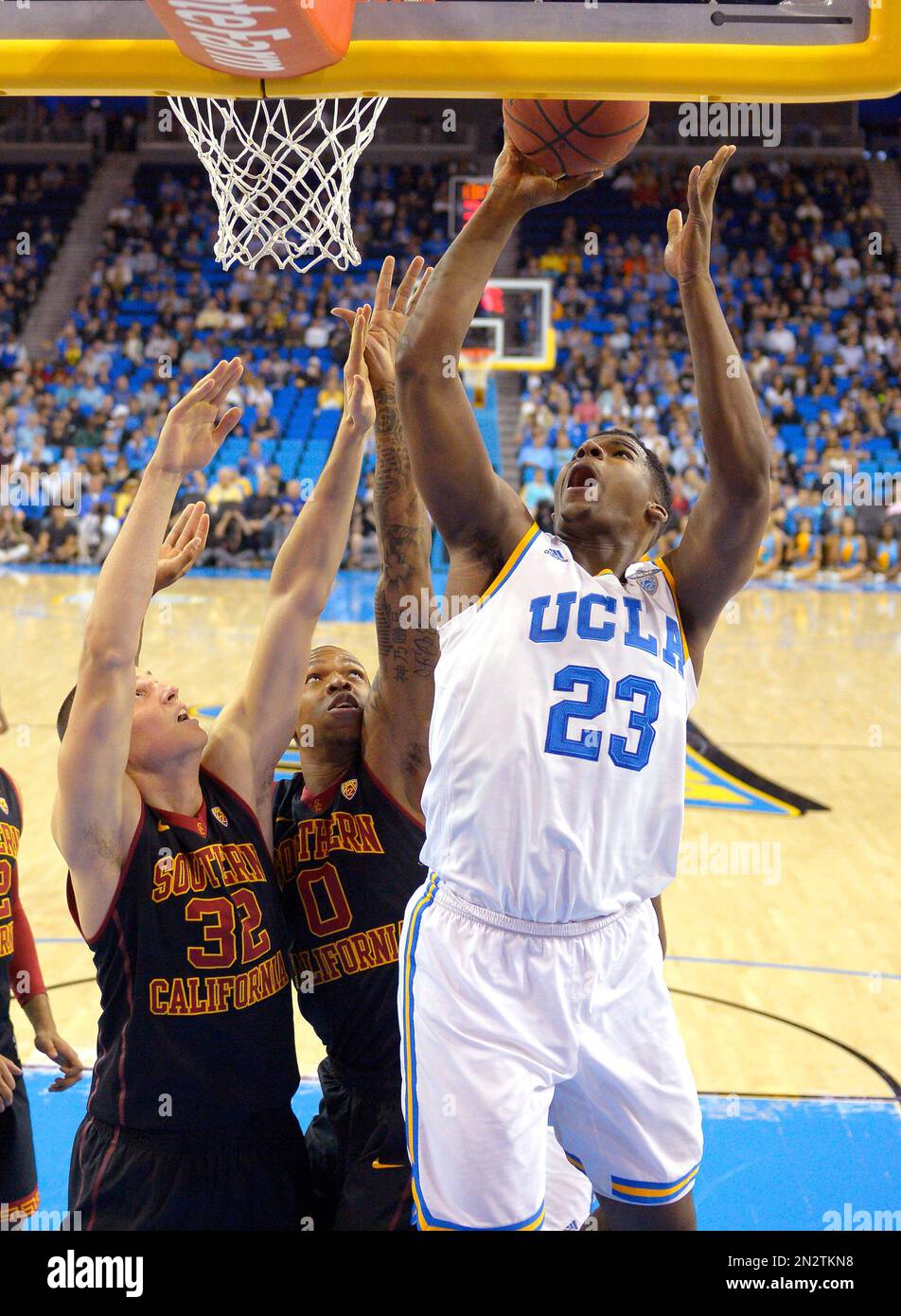 UCLA forward Tony Parker, right, shoots as Southern California forward ...