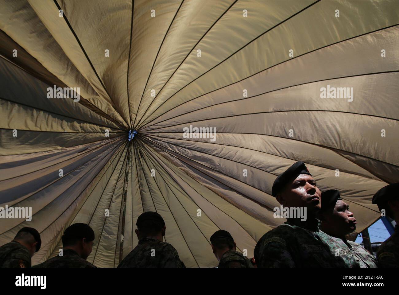 Members of the Philippine National Police Special Action Force wait ...
