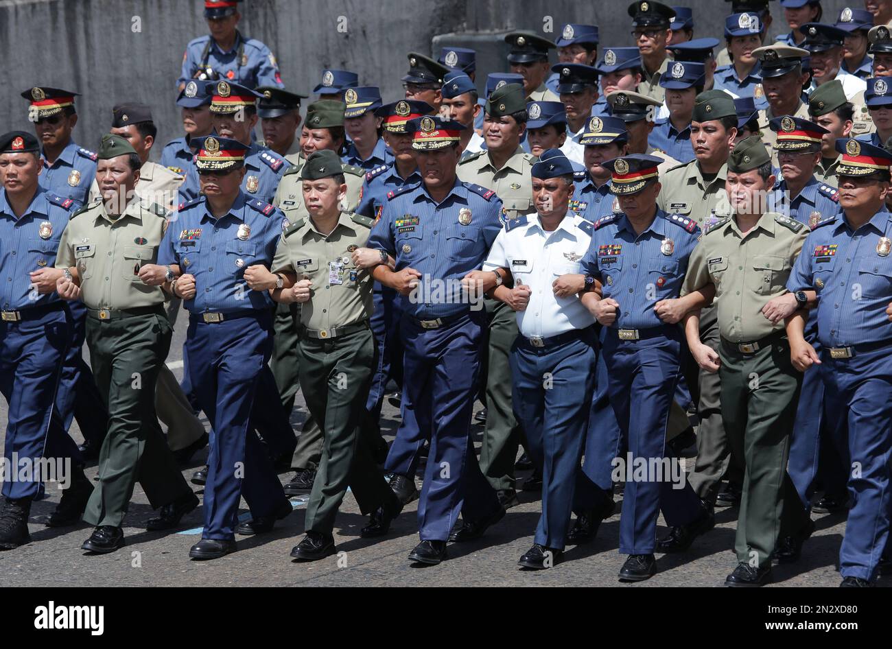 Members of the Philippine police and Armed Forces of the Philippines ...