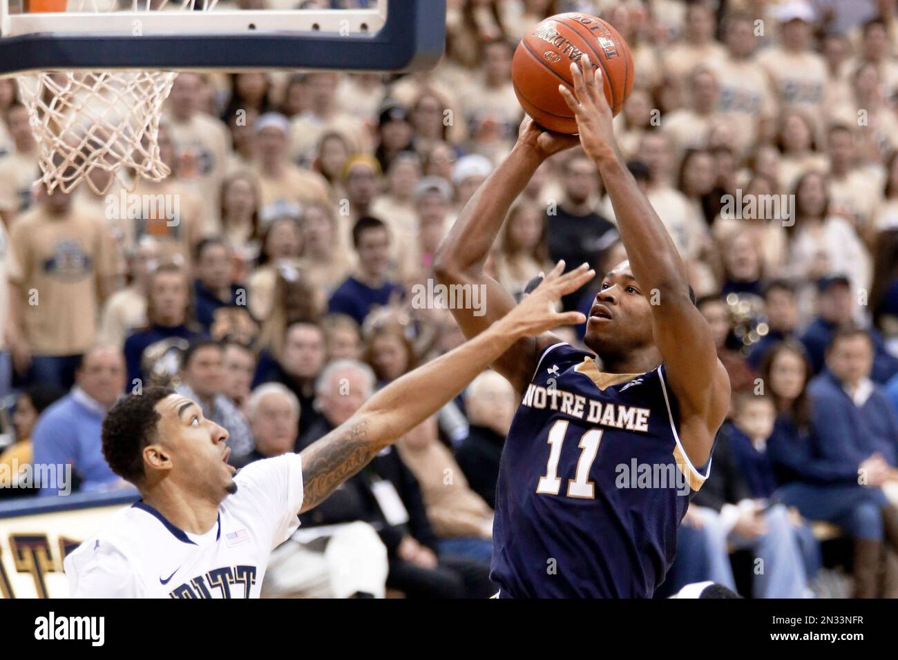 Notre Dame's Demetrius Jackson (11) shoots over Pittsburgh's Cameron ...